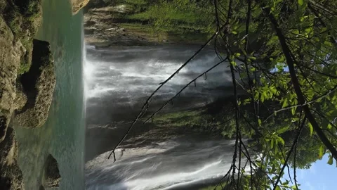 4K Nature Slow motion A waterfall with a... | Stock Video | Pond5