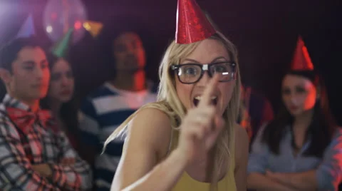 4K Nerdy girl standing out from the crow... | Stock Video | Pond5