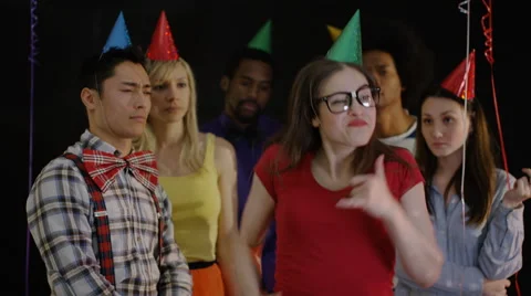 4K Nerdy girl standing out from the crow... | Stock Video | Pond5