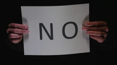 4K NO Sign Being Hold By Hands - Black B... | Stock Video | Pond5