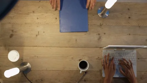 4K Overhead view looking down at office ... | Stock Video | Pond5