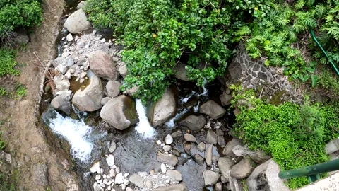 4K Overhead View Of Mini Waterfalls Casc... | Stock Video | Pond5