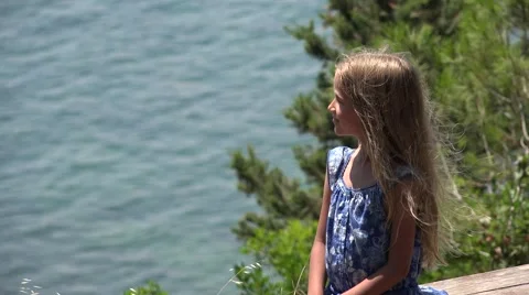 4K Portrait of Happy Thinking Little Gir... | Stock Video | Pond5