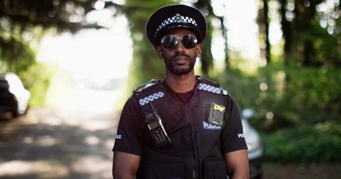 Police Officer Serious Stock Footage ~ Royalty Free Stock Videos | Pond5