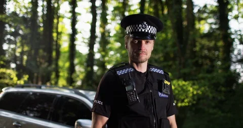 4K Portrait of smiling cop with his part... | Stock Video | Pond5