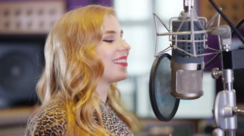 4K Portrait smiling female vocalist in r... | Stock Video | Pond5