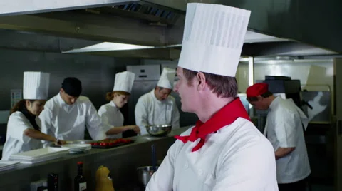 4K Portrait of smiling head chef and his... | Stock Video | Pond5