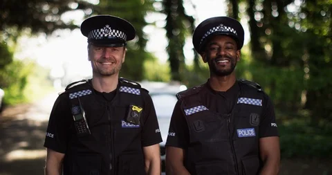4K Portrait of smiling police officer pa... | Stock Video | Pond5