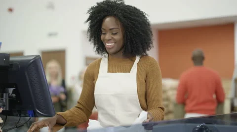 4K Portrait smiling worker at grocery st... | Stock Video | Pond5