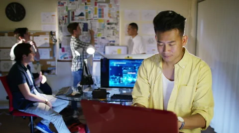 4K Portrait of smiling young computer pr... | Stock Video | Pond5