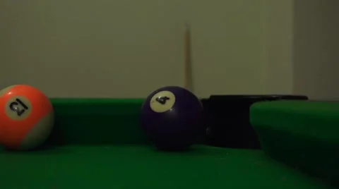 4k Potting the purple pool ball | Stock Video | Pond5