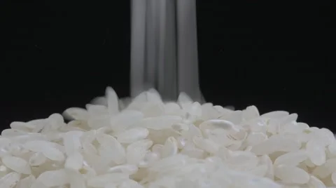4K Rice Grains Pouring Closeup Black Bac... | Stock Video | Pond5