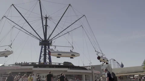 4K rocketship carousel spinning above cr... | Stock Video | Pond5