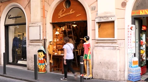 4K Rome Italy, Pinocchio wood carving gi... | Stock Video | Pond5