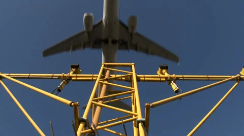 4K Runway lights with passing airplane | Stock Video | Pond5