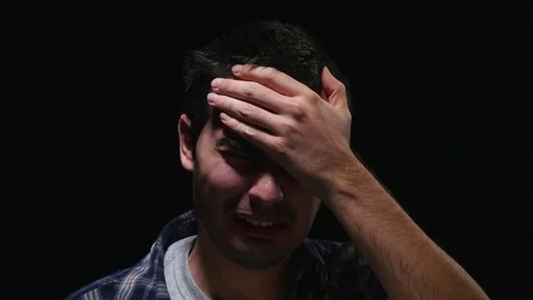 4K Sad Crying Young Adult Black Backgrou... | Stock Video | Pond5