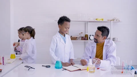 4K, In the school science lab, kids are ... | Stock Video | Pond5