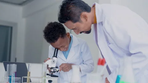 4K, A science teacher, teaching a studen... | Stock Video | Pond5