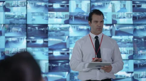 4K Security officer communicating with s... | Stock Video | Pond5