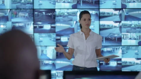 4K Security officer communicating with s... | Stock Video | Pond5