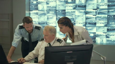 4K Security staff watching screens & dis... | Stock Video | Pond5