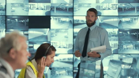 4K Security team working together in obs... | Stock Video | Pond5