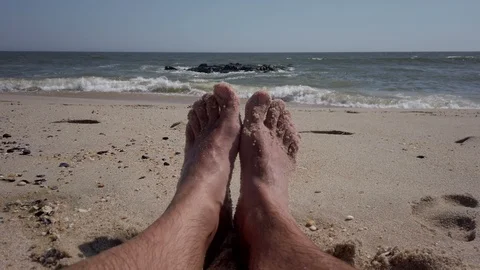 4K shot of the bare feet sliding on the ... | Stock Video | Pond5