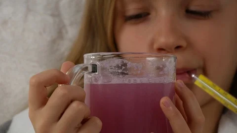 4K Sick Child with Drinking Drugs, Sad I... | Stock Video | Pond5