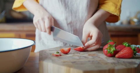 4K Side View Chopping Strawberry on wood... | Stock Video | Pond5