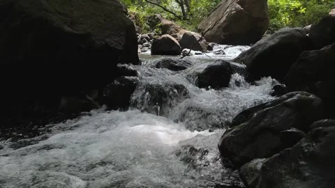 4K Slow motion Nature river in the middl... | Stock Video | Pond5