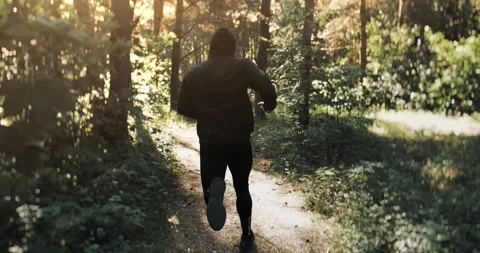 4K slow motion shot of man running throu... | Stock Video | Pond5