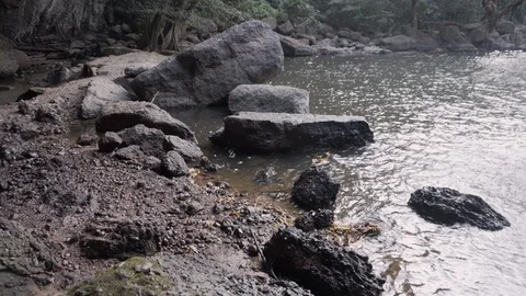 4k slow tilt up of a landscape in the mi... | Stock Video | Pond5