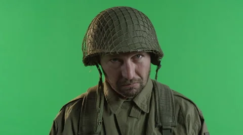 4K Soldier on green screen looks at the ... | Stock Video | Pond5