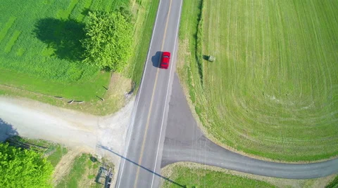 4K sports car pulling onto highway from ... | Stock Video | Pond5