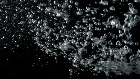 4K - Stream of a underwater bubbles. Bla... | Stock Video | Pond5