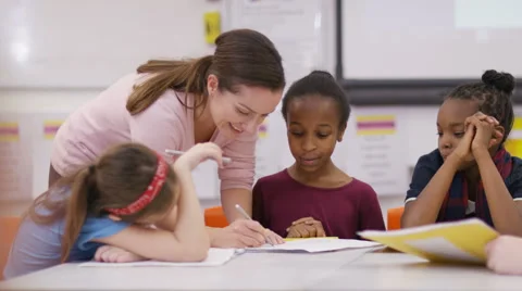 4K Teacher working with young pupils in ... | Stock Video | Pond5