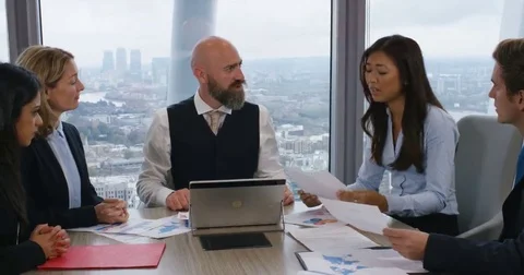 4k, A team of suit-clad businesspeople h... | Stock Video | Pond5