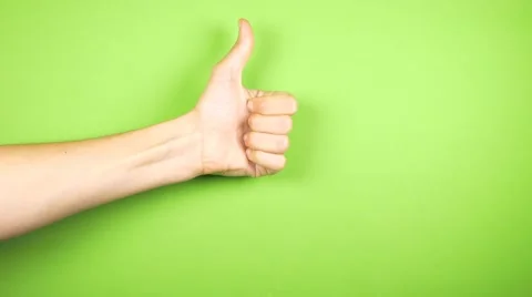 4k thumbs up hand green screen backgroun... | Stock Video | Pond5