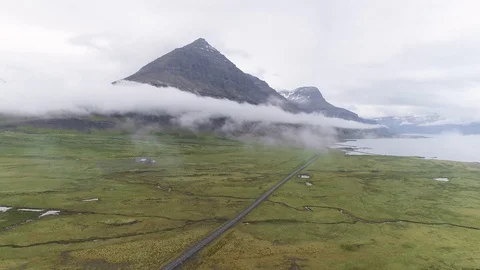 4K Tilt Aerial Búlandstindur Mountain D... | Stock Video | Pond5