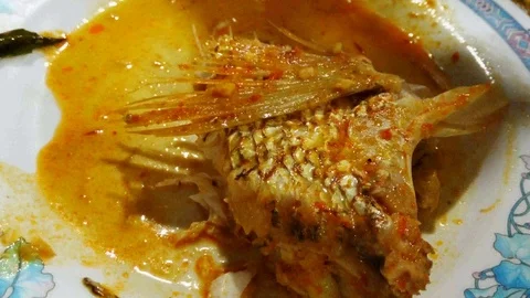 4K time lapse on eating Curry fish | Stock Video | Pond5