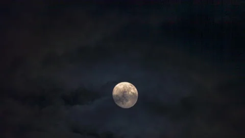 4K time lapse of full moon rising behind... | Stock Video | Pond5
