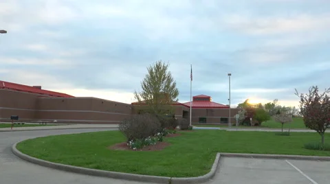 4k time lapse of sunset behind school bu... | Stock Video | Pond5