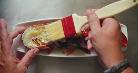 4K Top View Chef wiping butter on grille... | Stock Video | Pond5