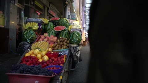 4K Traditional cart hawker selling fruit... | Stock Video | Pond5