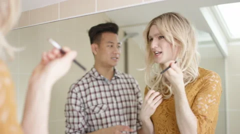 4K Transvestite man getting ready shares... | Stock Video | Pond5