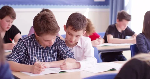 4k, Two boys in a school classroom study... | Stock Video | Pond5
