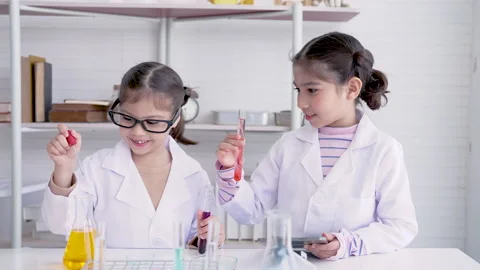 4K, Two kid Asian girls, standing in sci... | Stock Video | Pond5