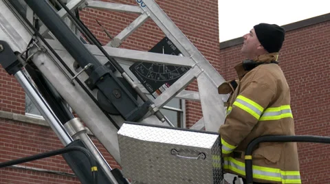 4K UHD 60fps - Fireman operating giant l... | Stock Video | Pond5