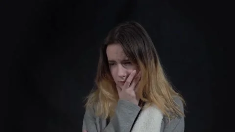 4k Unhappy young woman crying while posi... | Stock Video | Pond5
