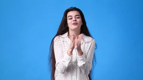 Girl Clapping Cheeks Stock Videos – Royalty-Free HD & 4K Videos